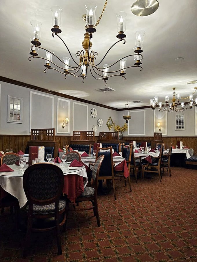 Elegant chandeliers cast the kind of flattering light that makes everyone at the table look like they've just returned from vacation, even on a Tuesday.