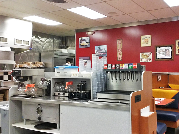 The coffee station&mdash;where morning transformation begins. That soda fountain has witnessed more Monday morning revivals than a motivational speaker.