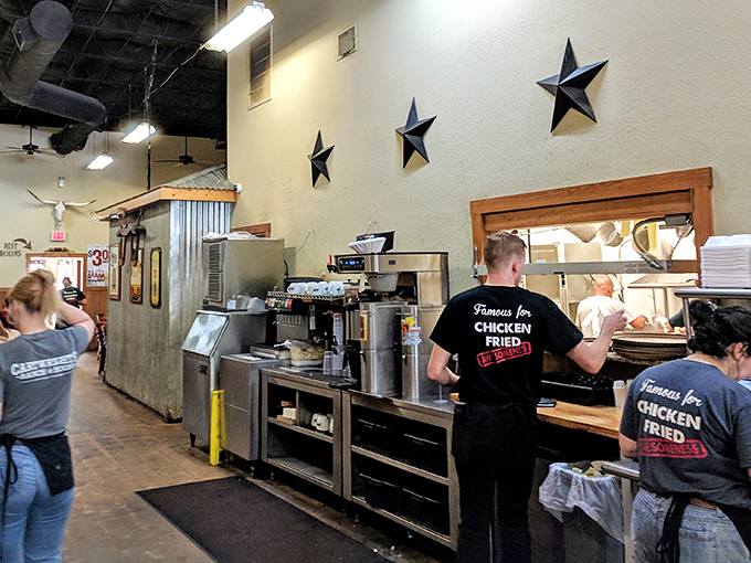 The staff sporting "Famous for Chicken Fried Steak" shirts aren't just employees&mdash;they're ambassadors of Texas comfort food, working their magic behind the counter.