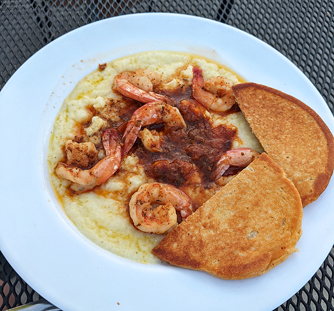 Shrimp and grits: The South's greatest love story, told in a bowl with a cornbread epilogue that'll leave you speechless.