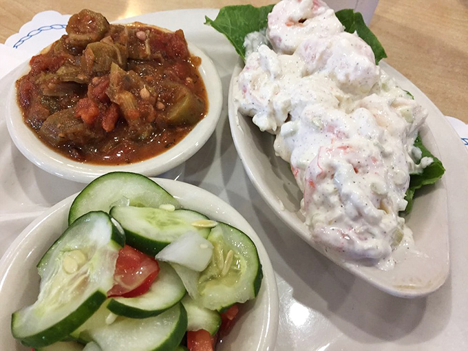 A seafood salad that makes eating healthy feel like cheating. That cucumber garnish is just showing off at this point.