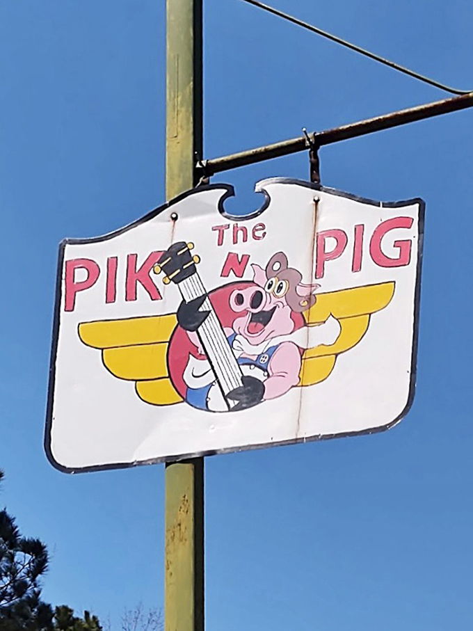 A flying pig with a guitar&mdash;because when your barbecue's this good, pigs really do soar. This sign promises musical flavors ahead.
