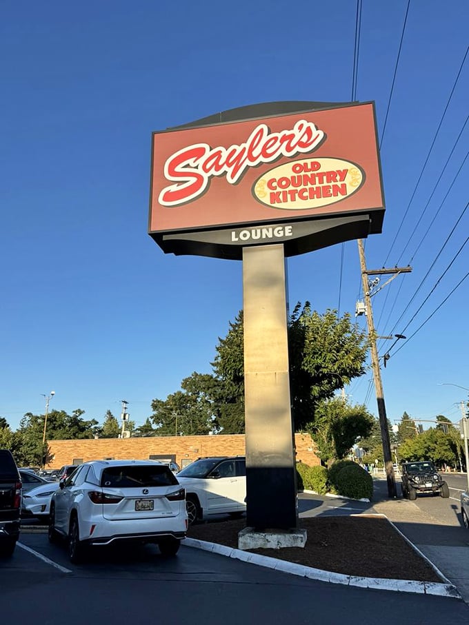 The sign stands tall like a carnivore's North Star. Your stomach's GPS has found its destination.
