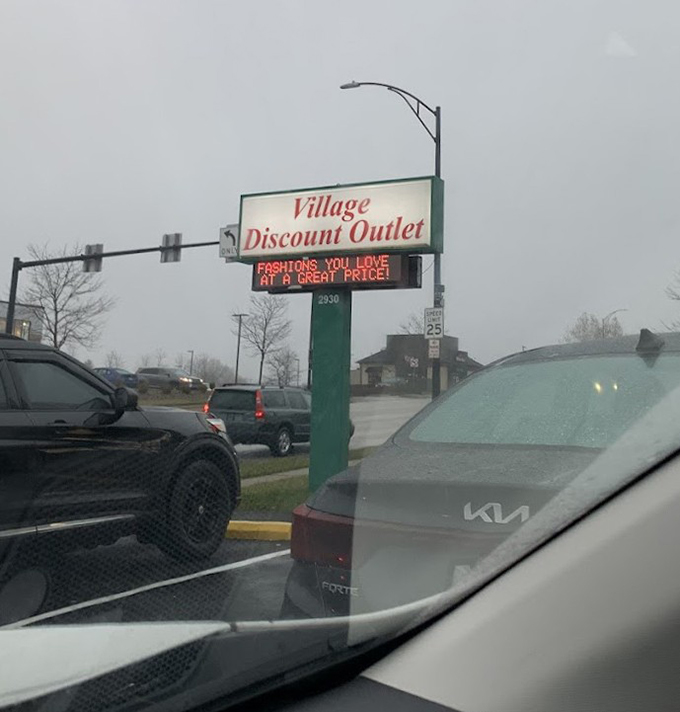 The roadside beacon of bargains announces its simple promise: "Fashions you love at a great price!" No false advertising here.