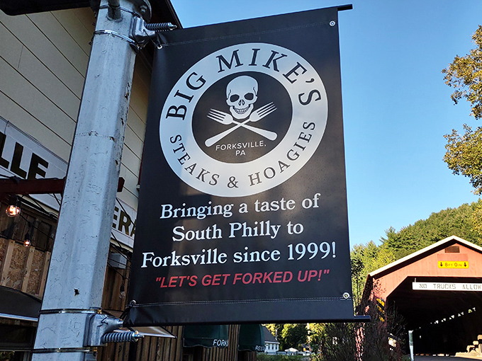 The bold black-and-white signage makes no apologies: "Let's Get Forked Up!" A battle cry for hungry travelers that perfectly captures the spirit.