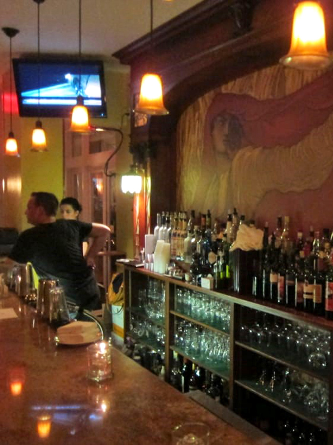 Where magic happens at the intersection of hospitality and craftsmanship. The bar's warm glow creates the perfect backdrop for evening revelations.