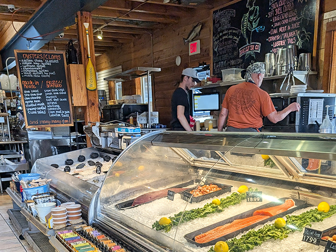 The seafood market display case – where tomorrow's dinner waits for you to make the right choice (spoiler alert: they're all right).