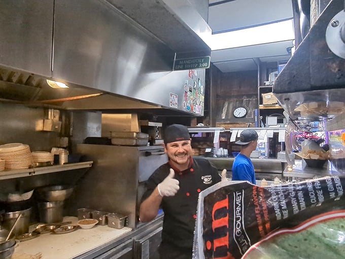 That thumbs-up says everything you need to know. In the kitchen, passion translates directly to the plate, and you can taste the difference.