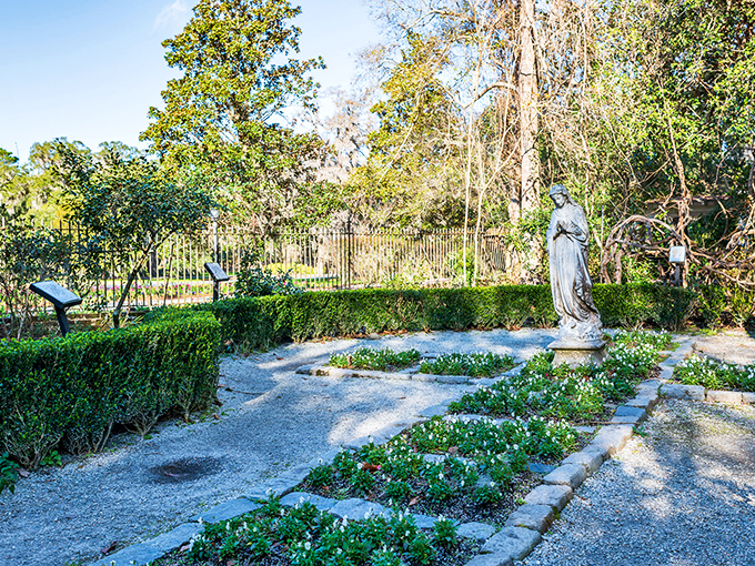 Formal garden paths lead to contemplative statuary, creating peaceful moments that feel worlds away from your inbox.