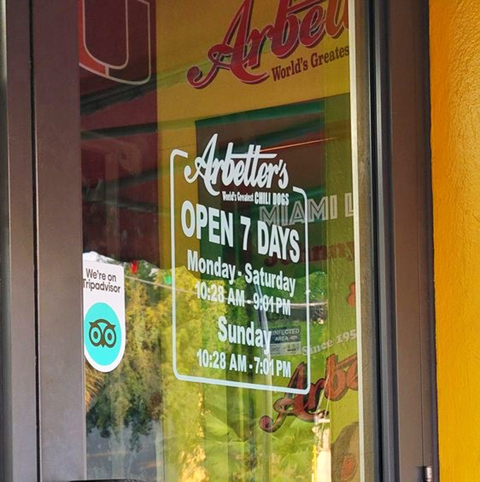 The door proudly announces "World's Greatest Chili Dogs" and seven-day availability&mdash;because hot dog cravings don't take weekends off.