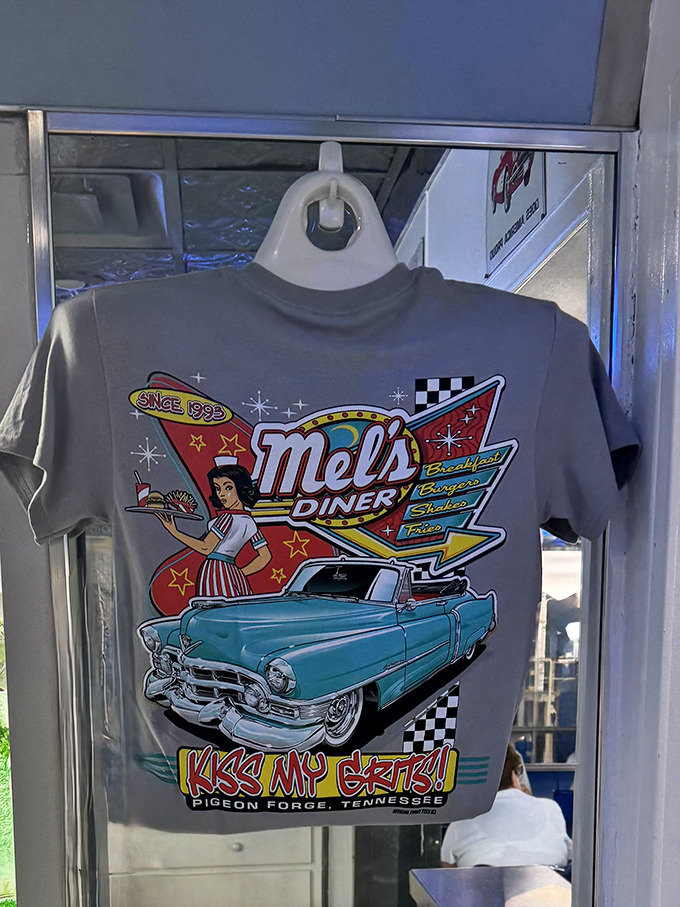 Souvenir t-shirts capture the essence of Mel's&mdash;classic cars, retro waitresses, and the promise of grits that might just change your life.