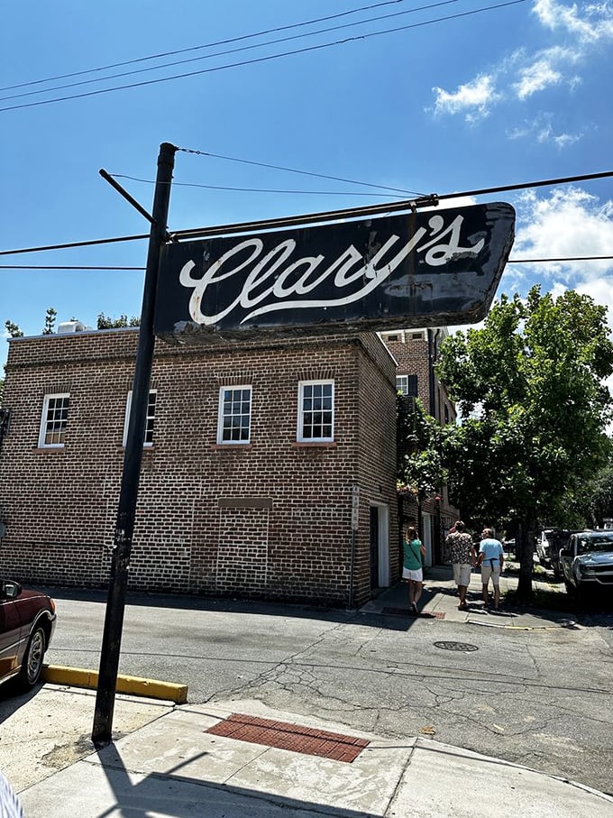 That vintage Clary's sign has pointed hungry folks toward breakfast bliss for generations, standing sentinel over Savannah's historic district.