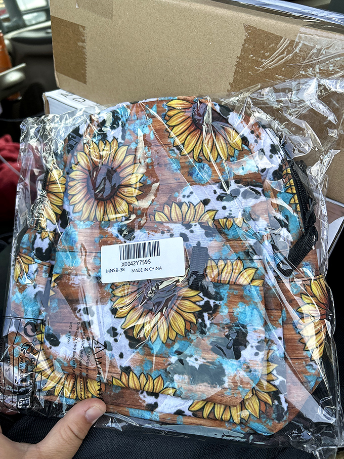 Sunflower power in portable form! This cheerful little backpack carries more than just your essentials&mdash;it brings the sunshine wherever you go.