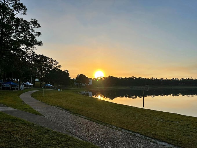 Sunset over Lake DeFuniak transforms the ordinary into the extraordinary &ndash; nature's nightly masterpiece reflected in perfect symmetry.