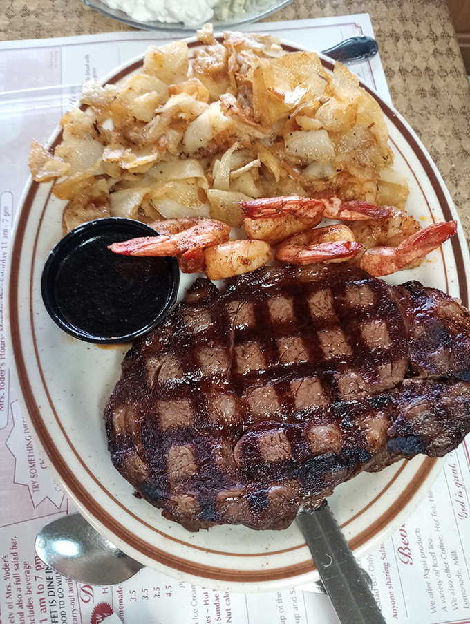 Surf meets turf in a dish that doesn't need to show off. Those home fries are the unsung heroes of this plate.