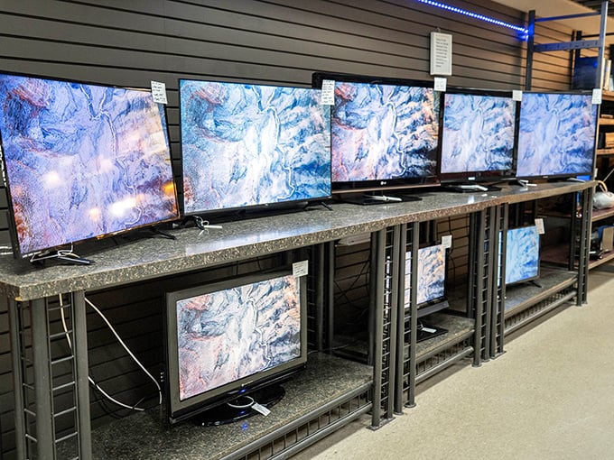 The electronics section requires a gambling spirit&mdash;these tested TVs display identical patterns, like a thrift store art installation.