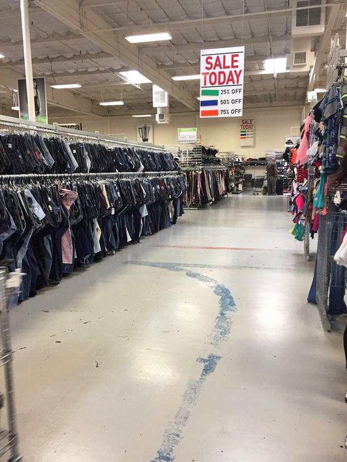 The denim aisle stretches into the horizon. In this blue jean paradise, your perfect fit is hiding somewhere between "mom jeans" and "questionably distressed."