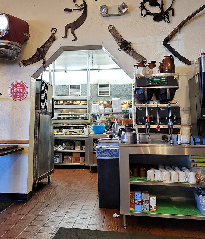 The pass to the kitchen &ndash; where breakfast magic happens behind the scenes, with decades of short-order wisdom built into every movement.