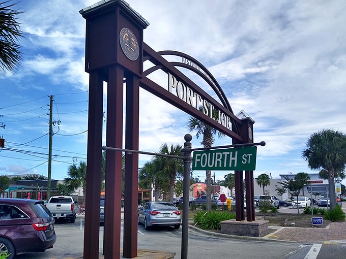 Enter Port St. Joe beneath the welcoming arch, where Fourth Street begins your journey into a coastal town that time politely decided not to rush.