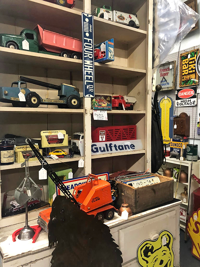 Toy trucks that hauled childhood dreams across living room floors. That Four Wheel Drive sign would make any collector brake hard.