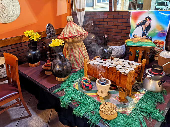 The coffee ceremony setup isn't just about caffeine&mdash;it's a cultural ritual. Those clay pots contain what might be the most aromatic coffee experience in Florida.