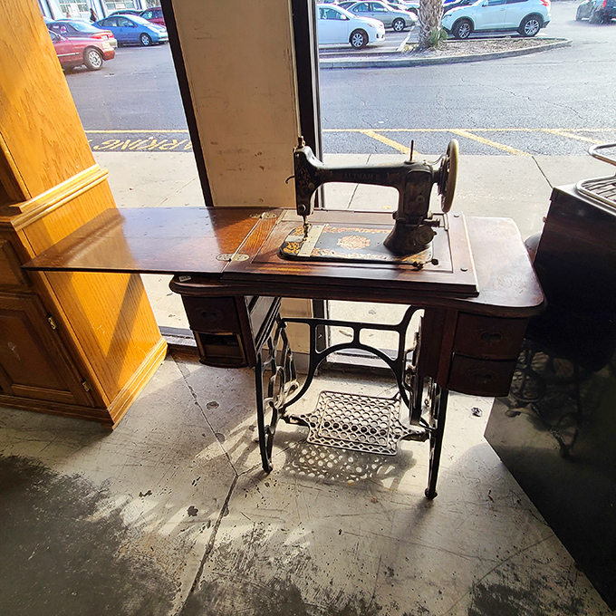 This Singer sewing machine has seen more fashion trends than Tim Gunn. Still ready to make it work!