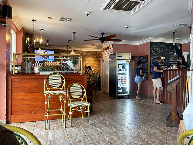 The entrance area's warm wood tones and European caf&eacute; chairs invite you to stay awhile &ndash; resistance is futile.