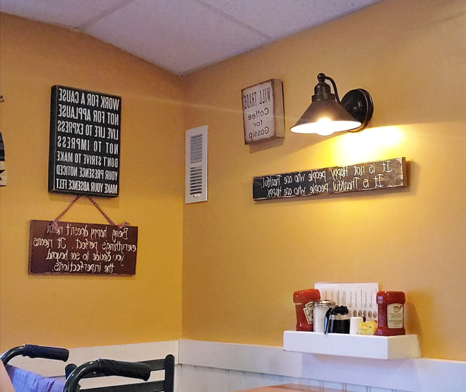 Wall wisdom and rustic décor create that "grandma's kitchen meets roadside philosophy" vibe that defines great diners.