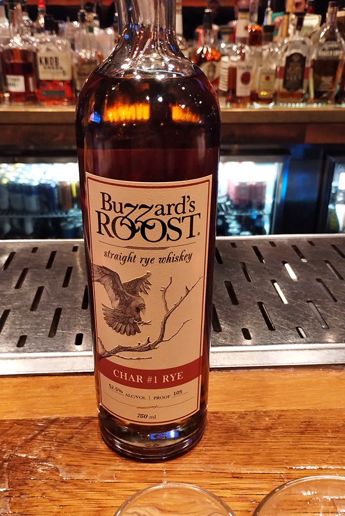 Buzzard's Roost whiskey stands ready for duty&mdash;transforming ordinary evenings into "remember that night?" stories with each amber pour.