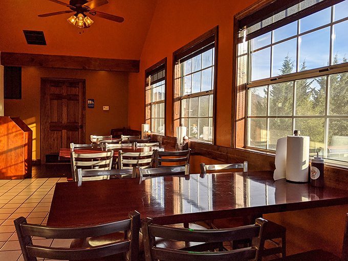 Warm wood tones and natural light create a dining room that feels like eating at a friend's mountain cabin &ndash; if your friend happened to be a barbecue genius.