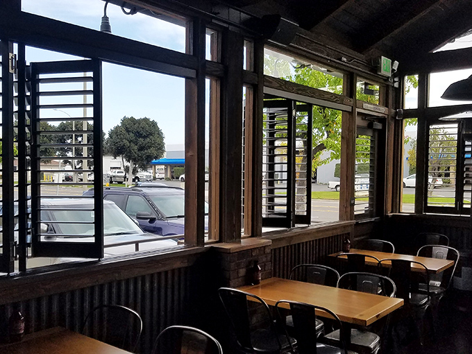 Window seats offer prime people-watching opportunities while you contemplate ordering seconds. The natural light is flattering to both you and your ribs.