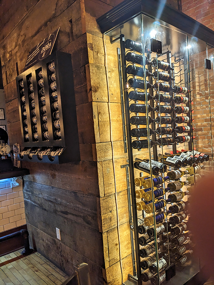 Not just a wine display—it's a temperature-controlled wall of possibilities, each bottle promising its own unique story and flavor journey.