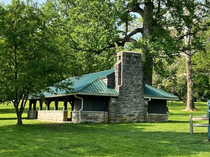 This rustic stone shelter has witnessed countless family reunions, birthday celebrations, and the timeless tradition of avoiding rain.