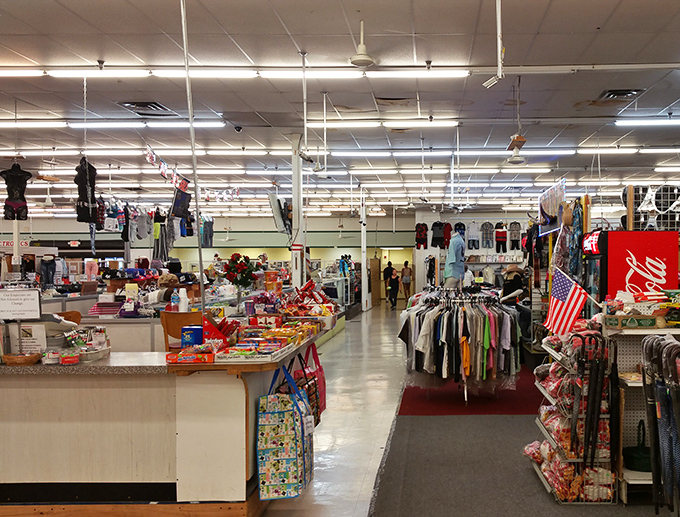Bright lights illuminate endless aisles of potential treasures at Delaware Flea Market, where the thrill of the hunt never ends.