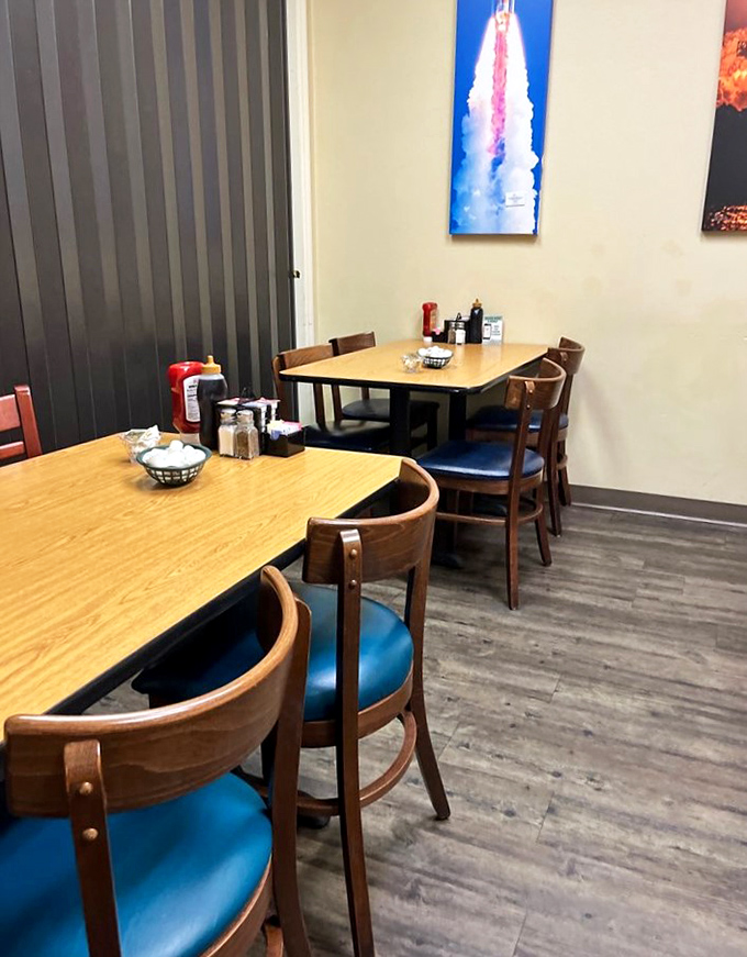 Space-themed artwork watches over diners like tasty mission control. At Cozy Corner, even rocket scientists take a break to appreciate perfect pancakes.