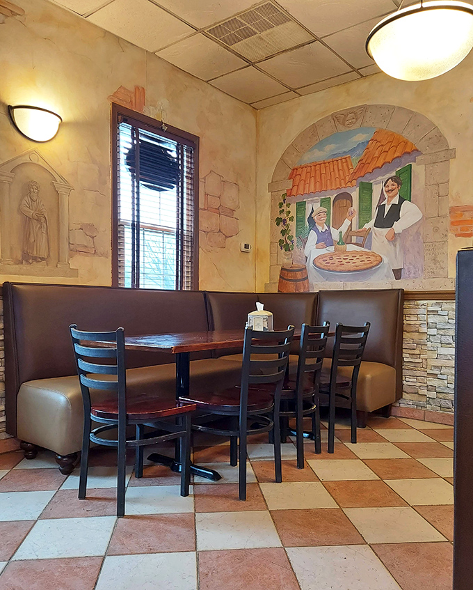 Italian murals transport diners to the old country while they feast. This booth isn't just a seat&mdash;it's a ticket to a European vacation without the airfare.