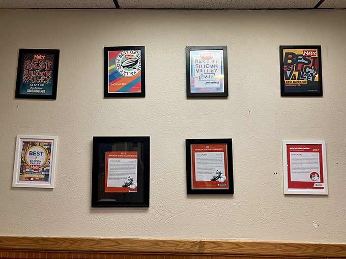 A wall of accolades that tells you what locals already know&mdash;this place has earned its reputation one smoky plate at a time.