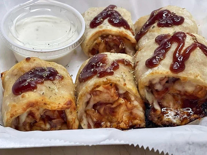 BBQ chicken rolls drizzled with sauce that would make a Southerner nod in approval. Portable barbecue genius wrapped in a neat little package.