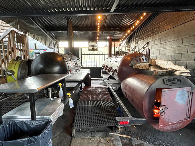 The smoking chamber—barbecue's holy sanctuary where patience transforms tough cuts into tender treasures through the magic of smoldering wood.