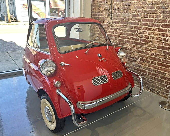 The adorable BMW Isetta proves not everything in a muscle car museum needs biceps&mdash;this microcar's front-opening door still brings smiles decades after its quirky debut.