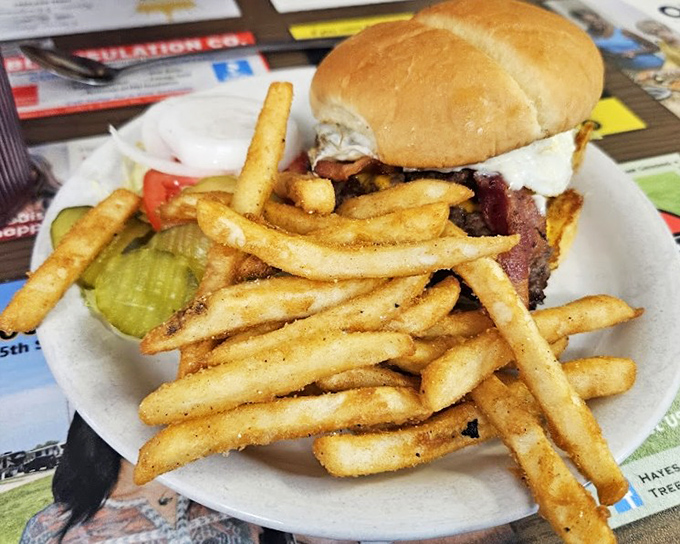 A proper diner burger doesn't need fancy aioli or artisanal buns &ndash; just honest ingredients, proper cooking, and enough fries to share (but you won't want to).