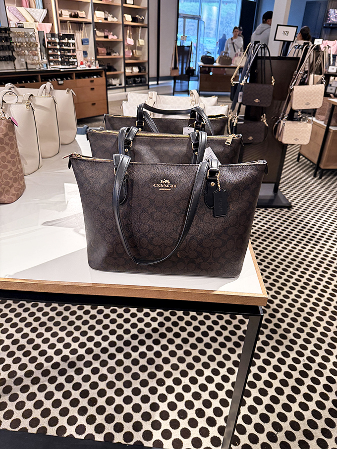 Coach bags displayed like the works of art they are. Your wallet may protest, but at these prices, it's practically fiscal responsibility.