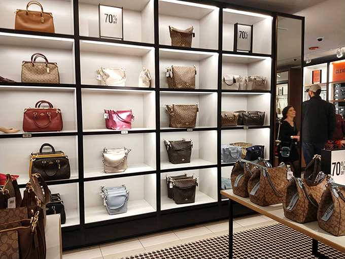 Designer handbags at 70% off&mdash;the wall of luxury that makes grown adults press their noses against the glass like kids at a candy store.