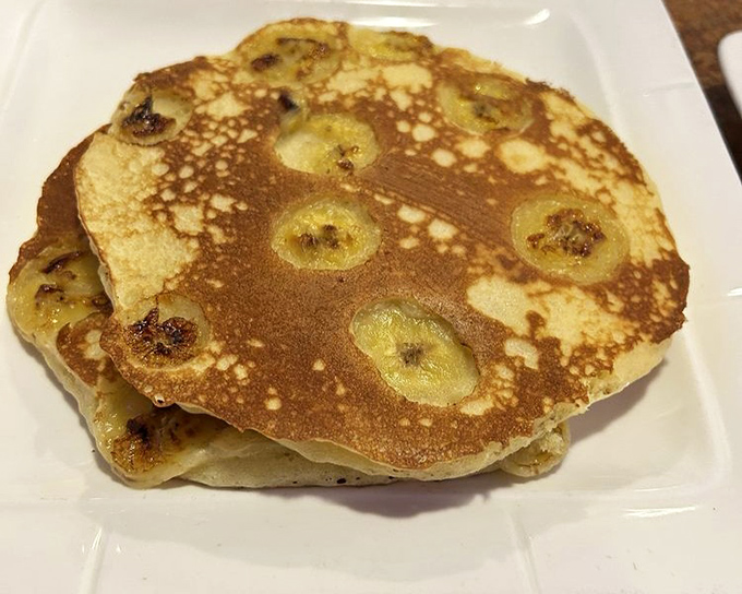 Banana pancakes with caramelized fruit baked right in&mdash;proof that someone in the kitchen understands that breakfast should never be boring.