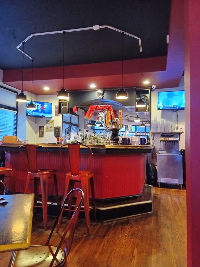The bar area glows with promise, offering craft beers and cocktails that complement the menu's creative offerings.
