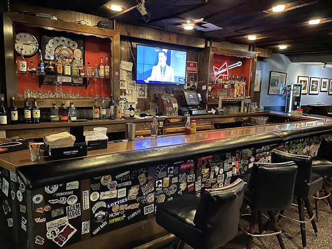 The bar area where time stands still but drinks keep flowing. Those barstools have supported the weight of both celebrity and sorrow.