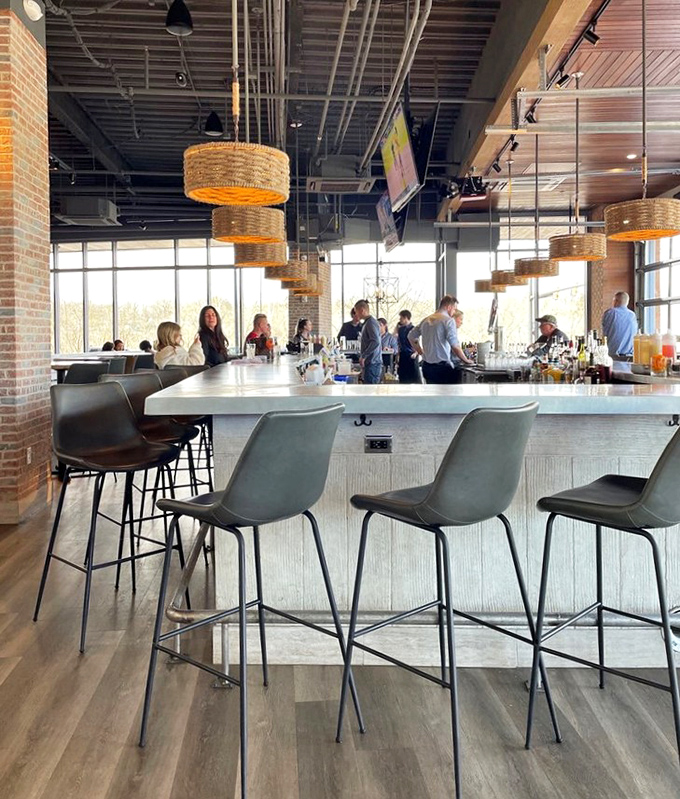 A bar area where pendant basket lights create the perfect mood for both serious cocktail appreciation and spontaneous friendship formation.