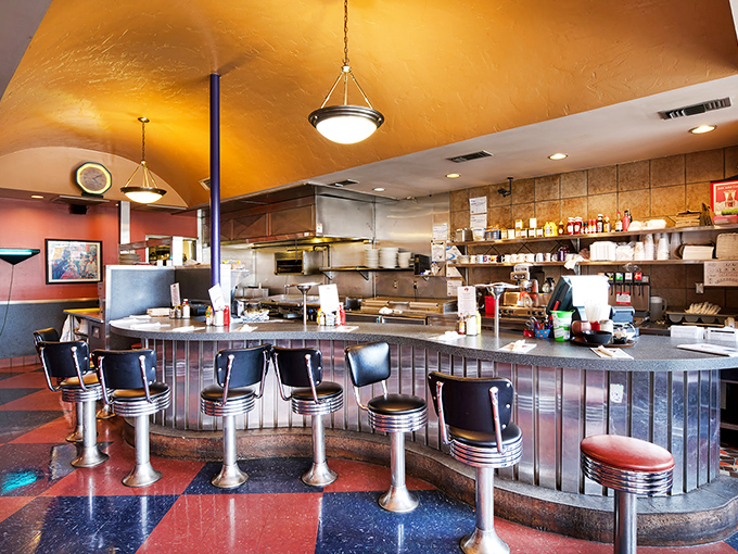 Counter seating that lets you watch breakfast theater unfold – where short-order cooks perform culinary magic just feet from your coffee cup.