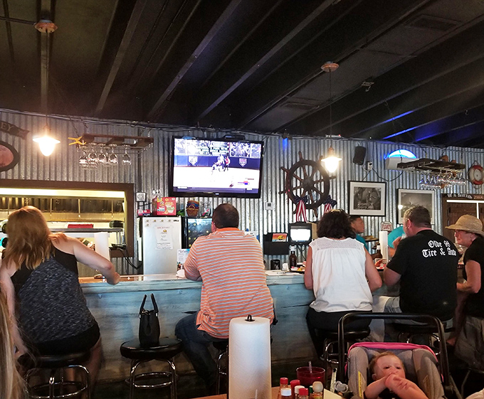 At the bar, sports on TV and cold beer on tap&mdash;because great seafood deserves the company of simple pleasures.