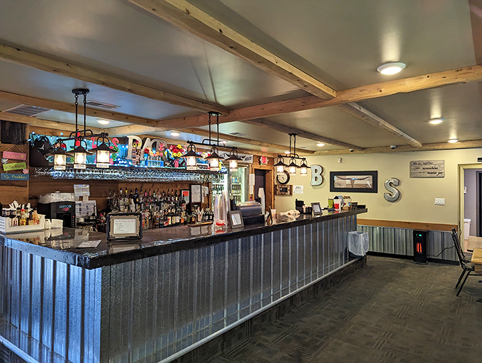 The bar at Bill's &ndash; where strangers become friends and friends become regulars. Wood, metal, and the promise of good times.